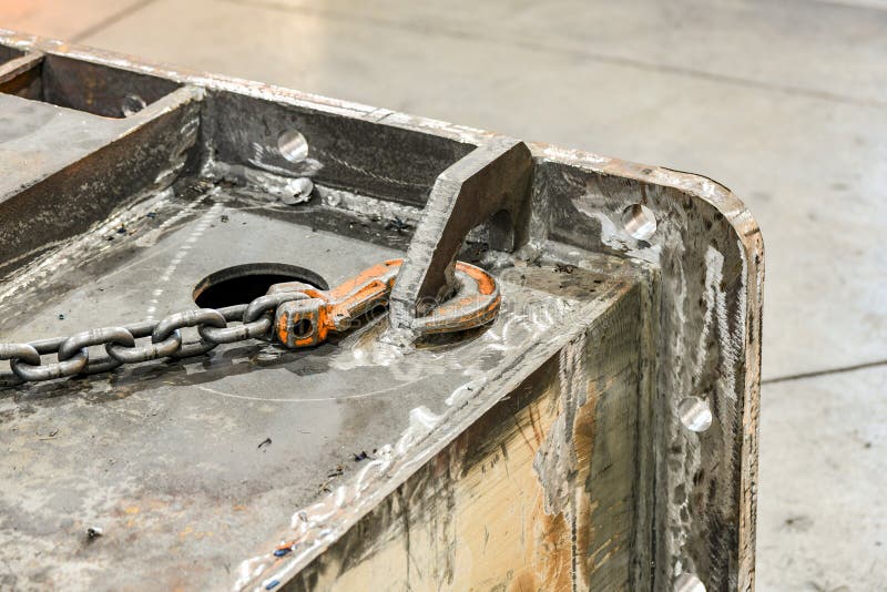 Hooking the Load with Chains on the Lifting Lugs on the Telpher Crane ...