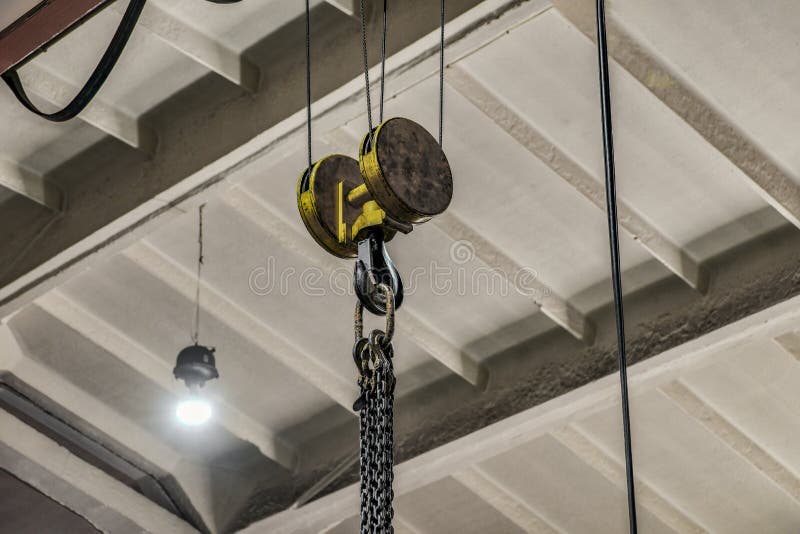 Hooking the Load with Chains on the Lifting Lugs on the Telpher Crane ...