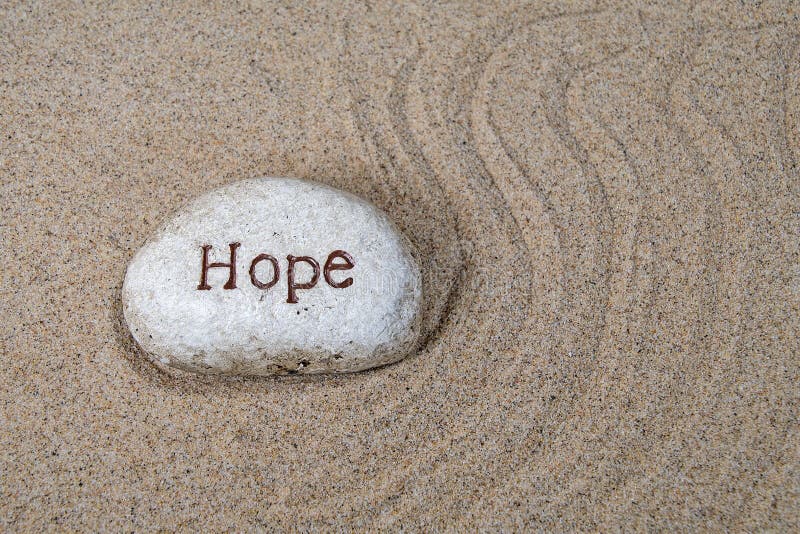 Hope rock in beach sand stock image. Image of sandy - 110984673