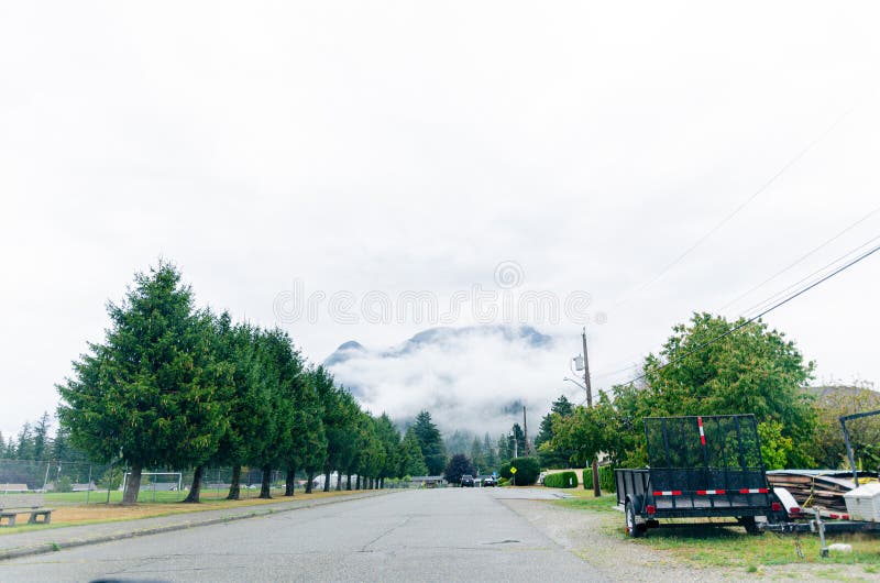 Hope Town in BC, Canada with Cloud Covered Mountains in the Background ...