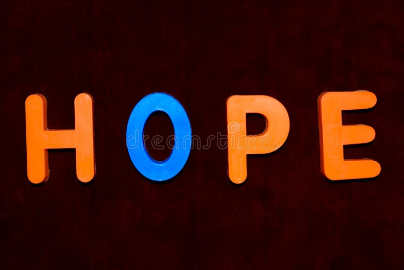 Hope Word Written with Different Colored Letter Blocks on a Dark ...