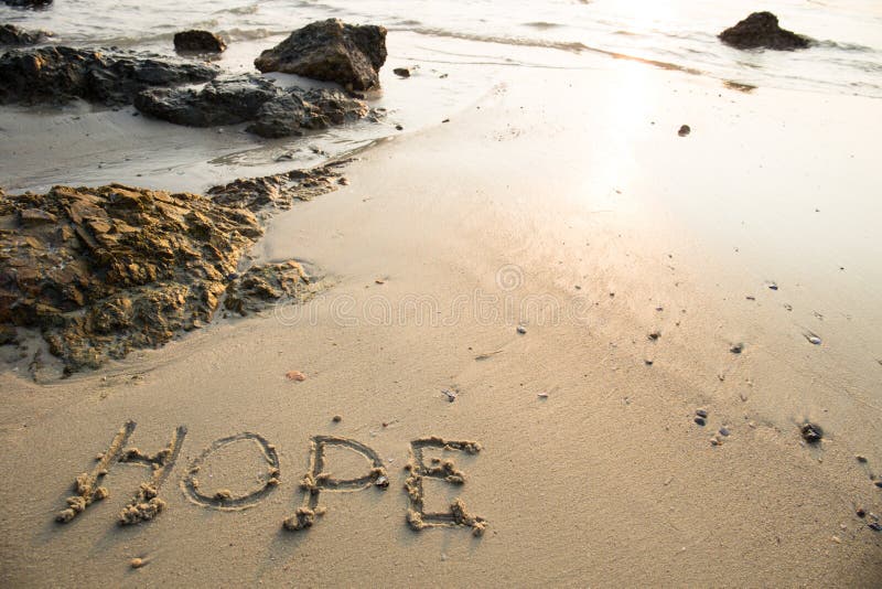 Hope written in Sand stock image. Image of grains, seashell - 19280279