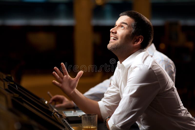 Hoping To Win Casino Player Stock Image - Image of lifestyle, pray ...