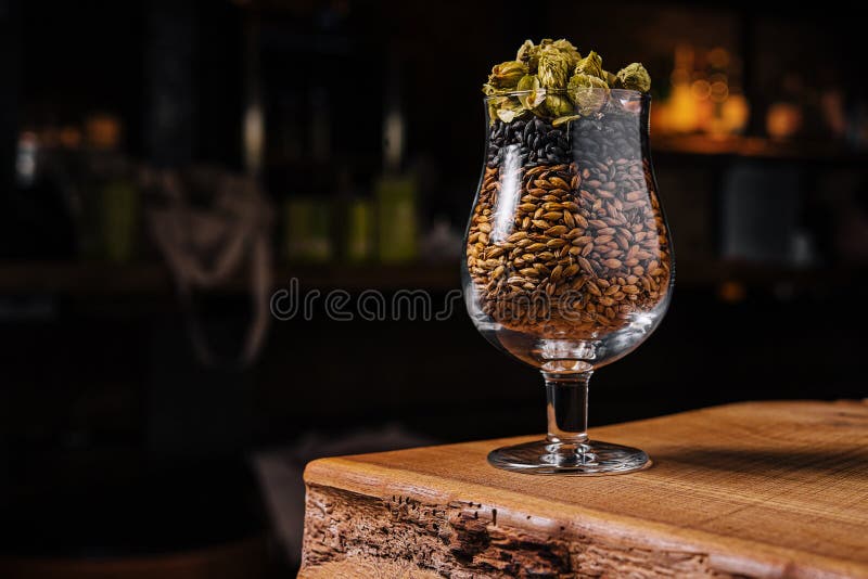Hops and Wheat in a Glass for Beer Stock Image - Image of closeup, wood ...