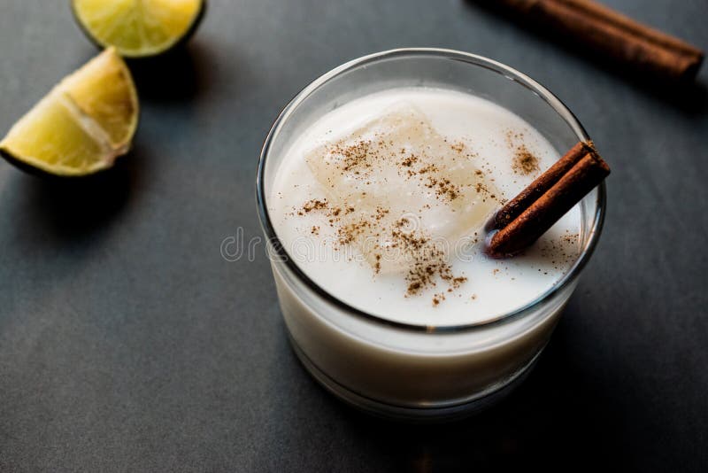 Horchata with Cinnamon Stick and Lime. Stock Photo - Image of rice ...