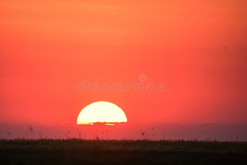 Horizon Line with Sun Setting Stock Image - Image of silhouette ...
