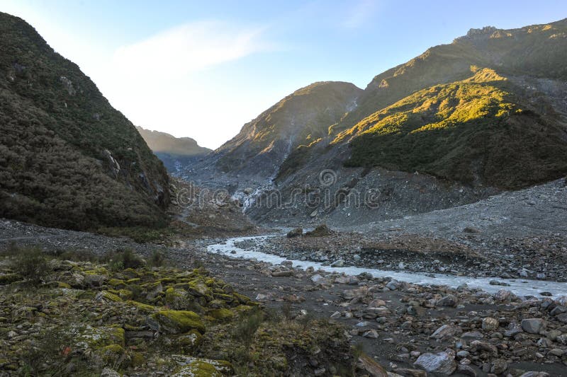 Horizontal of Glacier and Stream with Sunlight and Shade Stock Photo ...