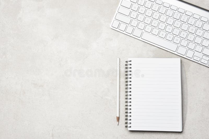 Horizontal High Key Workspace: a Note Pad with White Pencil and ...