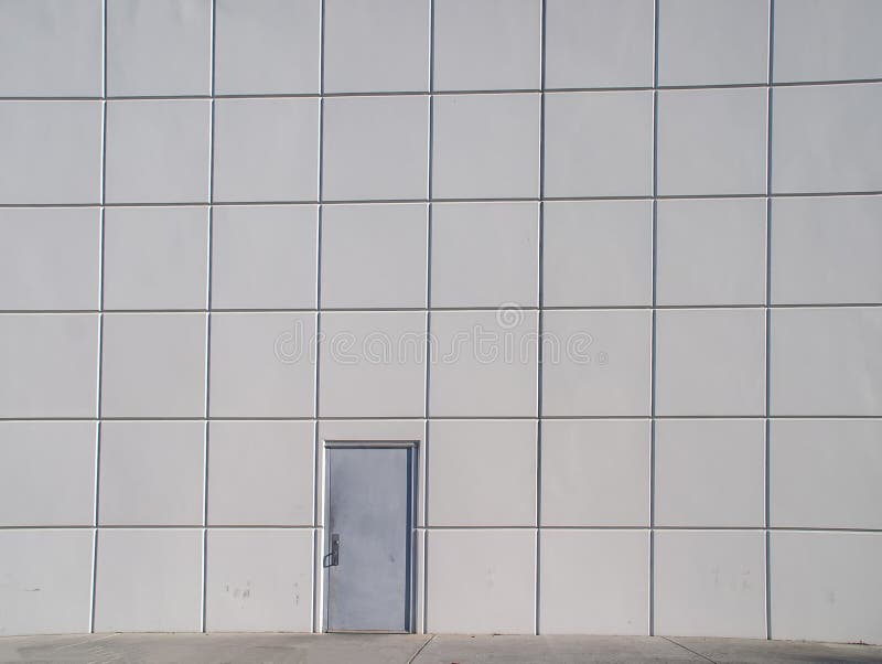 Horizontal Image of a Gray Door among Square Pattern on a Large ...