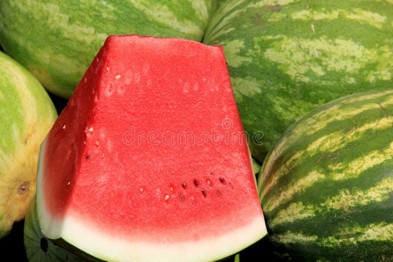 Horizontal Image of Large Watermelons, One Sliced Open To Show ...