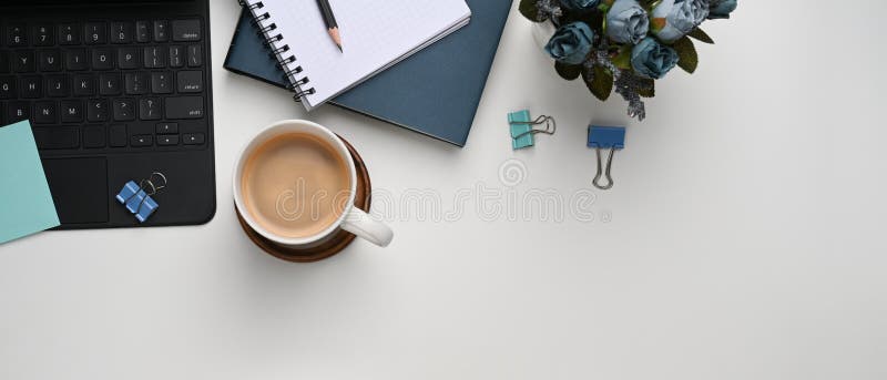 Horizontal Image of Office Desk with Coffee Cup, Plant, Notebook and ...