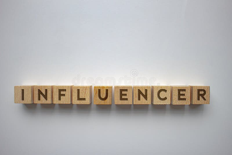 Horizontal Influencer Message Text on Wood Blocks on a Clear Background ...
