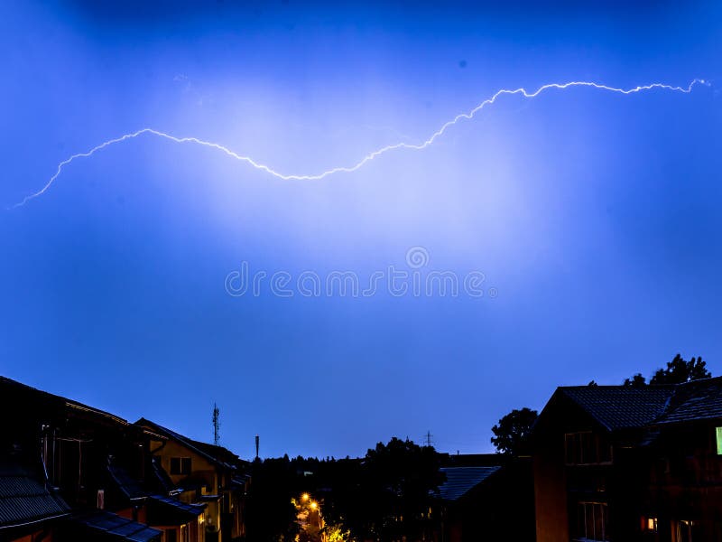 Horizontal Lightning through the Cloud during a Night Storm Stock Image ...