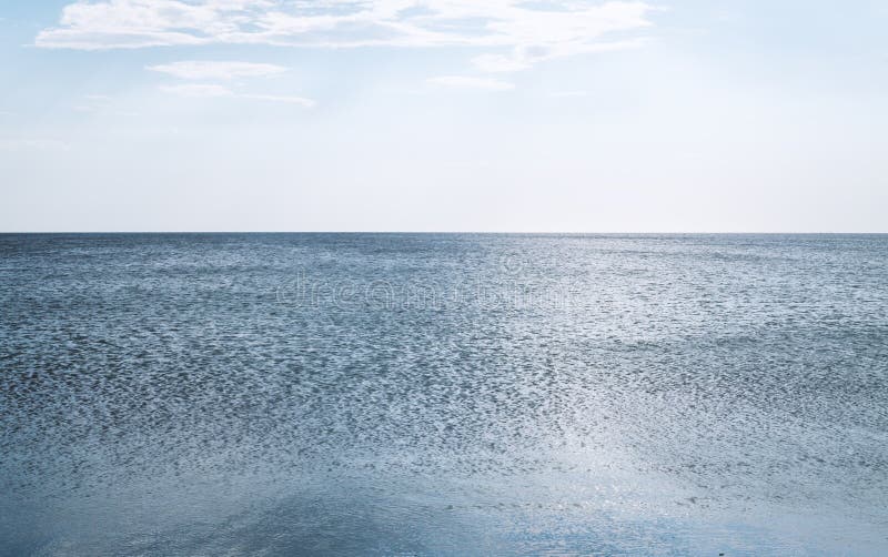 Calm seascape on clear day stock image. Image of beach - 199043605