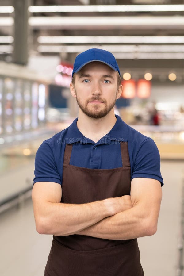 Confident Man Working in Store Stock Image - Image of uniform ...