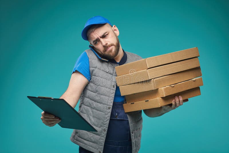 Pizza Guy Checking Order stock image. Image of delivering - 167468269