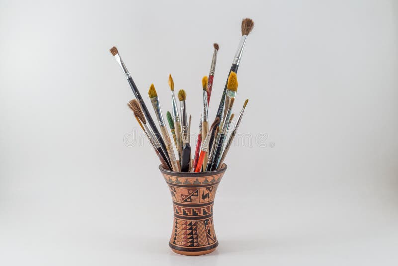 Horizontal Paint Brushes on Brightly Colored Tiles Stock Photo - Image ...