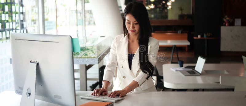 Businesswoman Sitting in Modern Office and Working with Computer. Stock ...