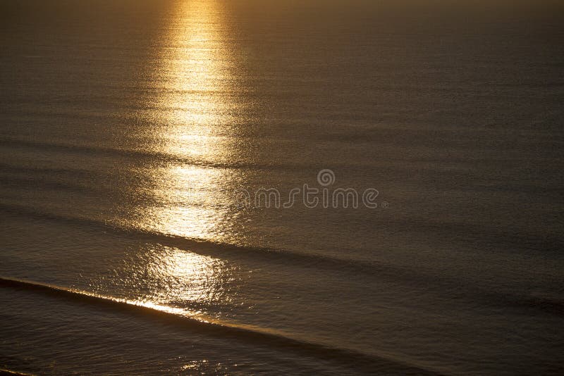 Reflection of the Setting Sun on the Ocean Stock Photo - Image of ...