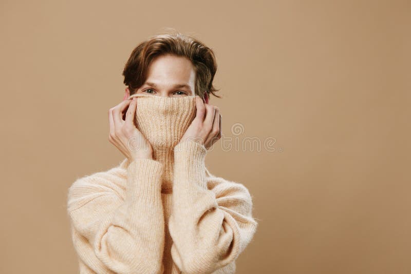 Young Man Pulling Sweater Over Head Stock Photos - Free & Royalty-Free ...