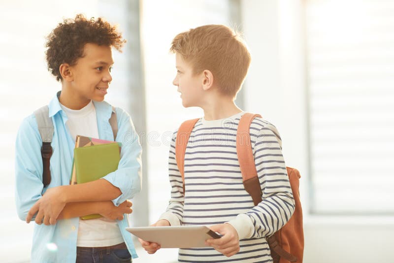 School Friends Discussing Something Stock Image - Image of child ...