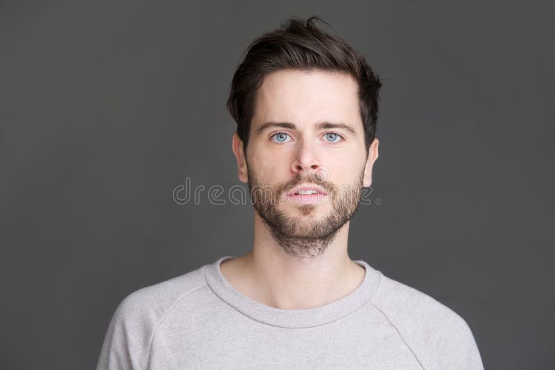 Horizontal Portrait of a Young Man with Beard Looking at Camera Stock ...
