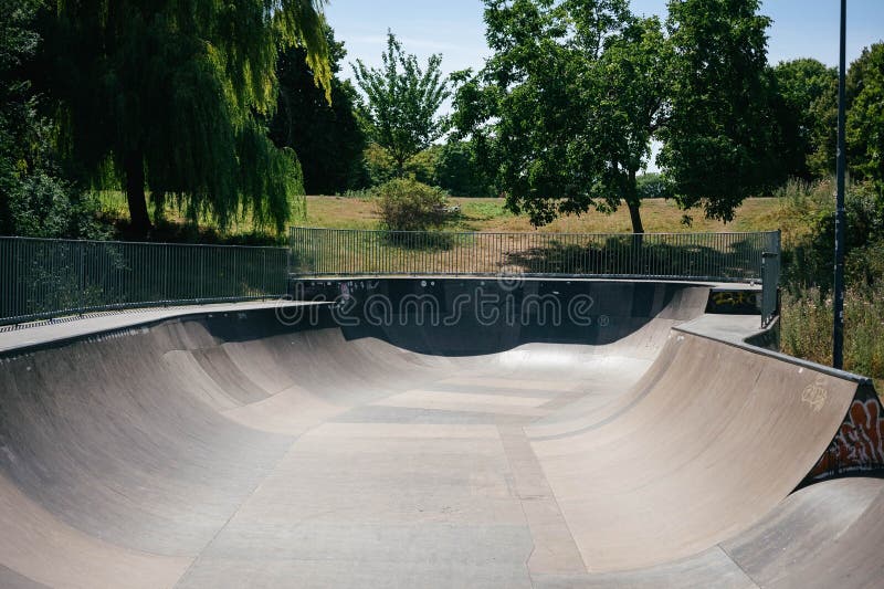 A Horizontal Shot of an Empty Skatepark in Summer. the Half Pipe or the ...