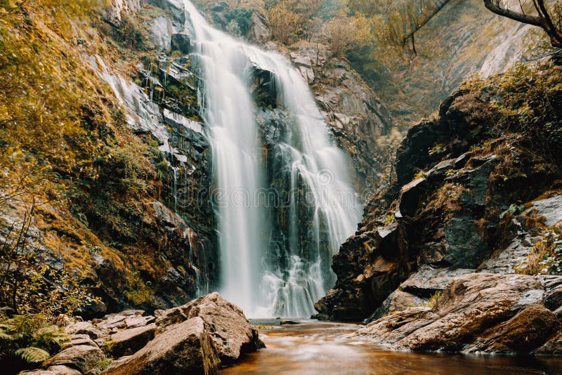 Horizontal Shot of a Long Exposure of a Giant Waterfall during Autumn ...