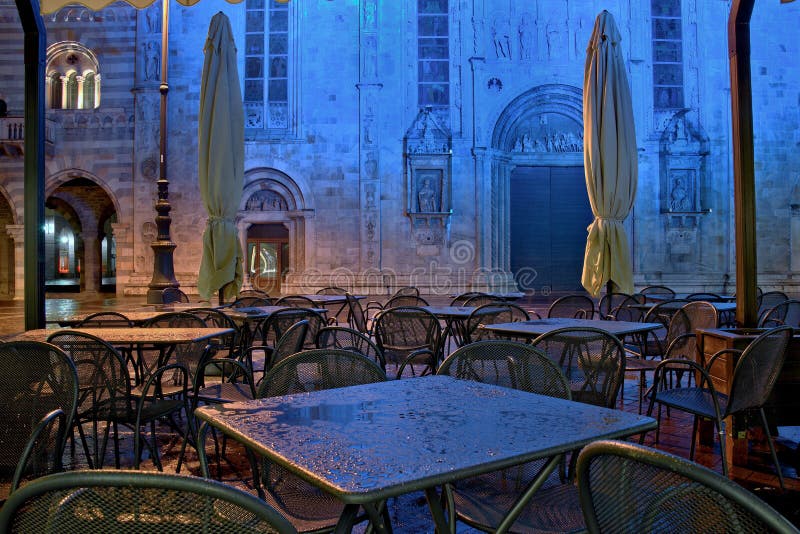 Horizontal Shot of an Outside Cafe in Front of an Italian Building with ...