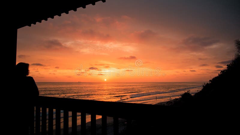 Horizontal Shot of a Person in Silhouette Looking at the Red Sunset ...
