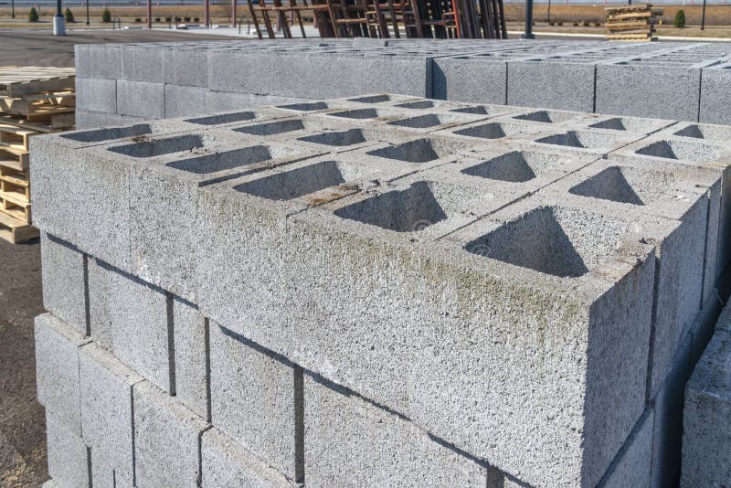 Cinder Blocks for Building a House are Piled in a Heap, Lying on the ...
