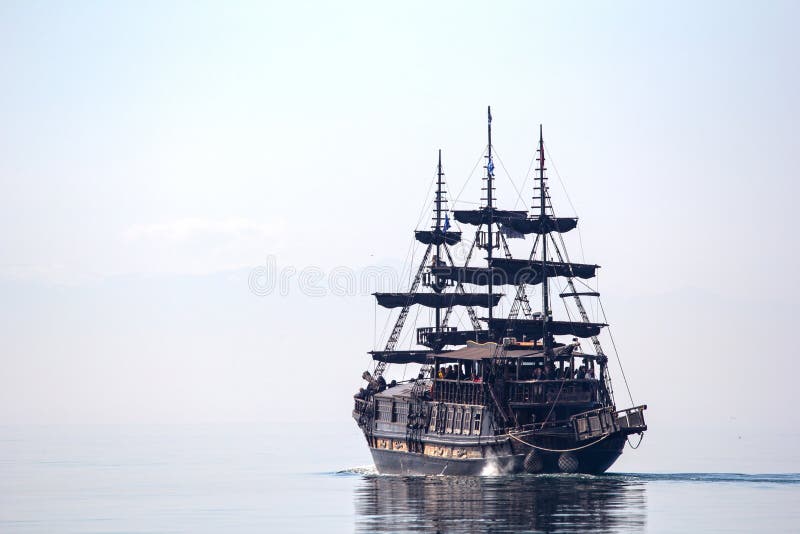 Horizontal Shot of a Tall Ship Sailing on Beautiful Clear Water during ...
