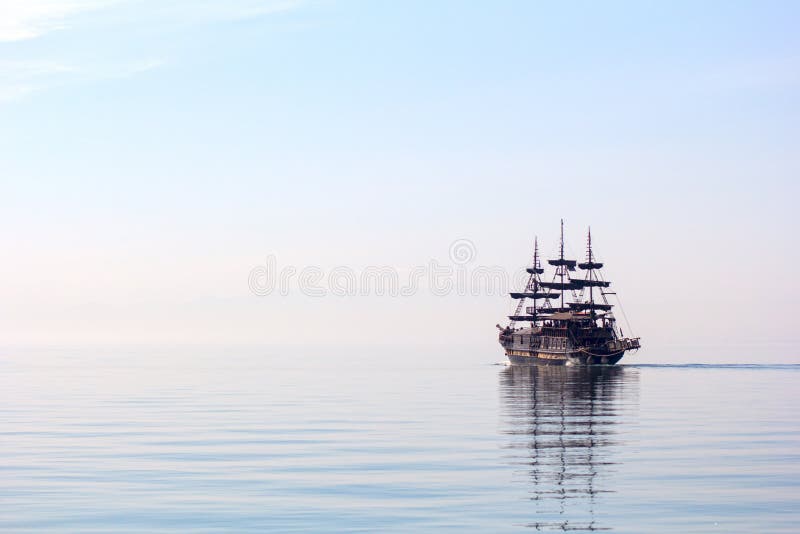 Horizontal Shot of a Tall Ship Sailing on Beautiful Clear Water during ...