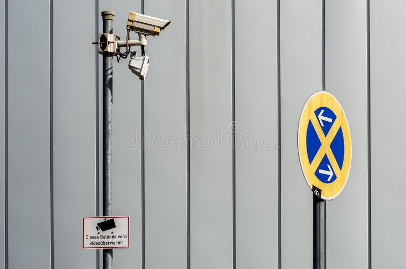 Horizontal Shot of a Traffic Camera and a Traffic Sign in Front of a ...