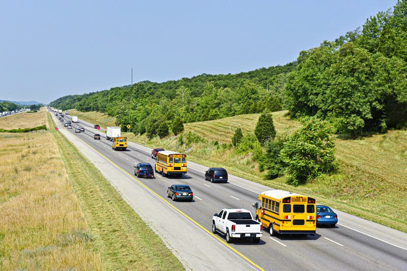 School Buses on Interstate stock photo. Image of clear - 168165374