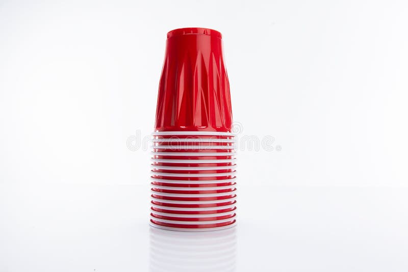 Stack of Disposable Red Plastic Cups Isolated on a White Background ...