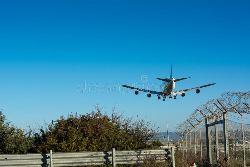 Horizontal View of a Cargo Airplane in the Landing Operation in Stock ...