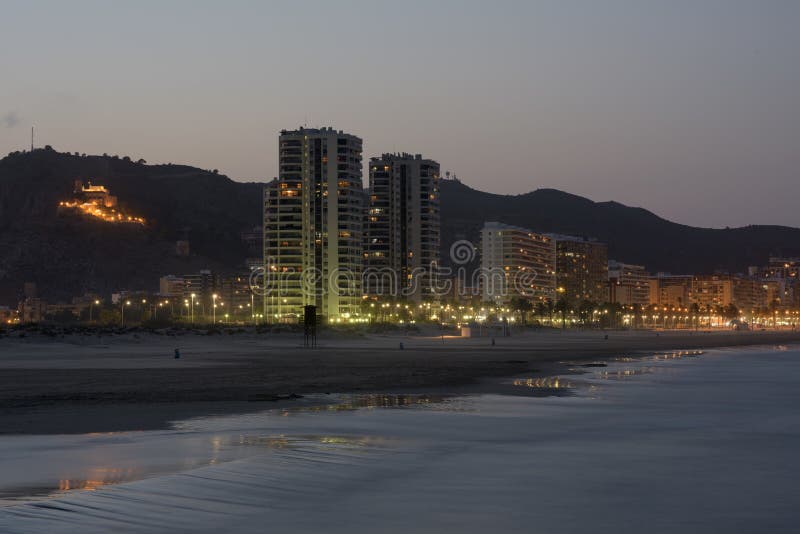 Horizontal View of Modern Skyscrapers on a Beach with Some Hills Behind ...