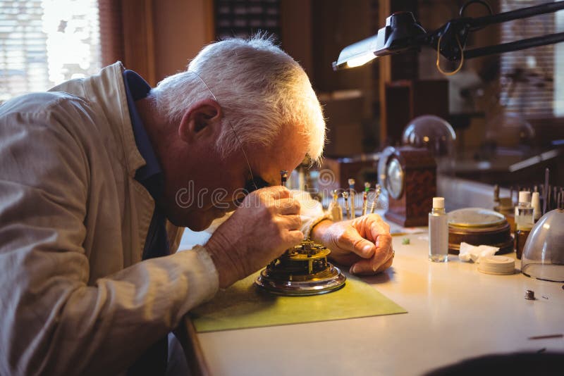 Horologist Repairing a Watch Stock Image - Image of metallic ...