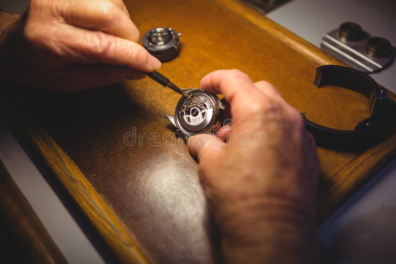 Horologist Repairing a Watch Stock Photo - Image of people, magnifier ...