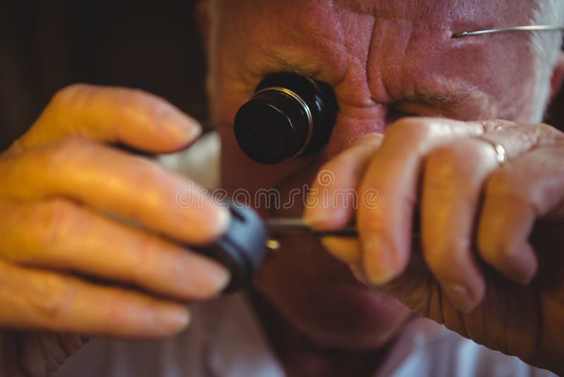 Horologist Repairing a Watch Stock Image - Image of focused, accurate ...