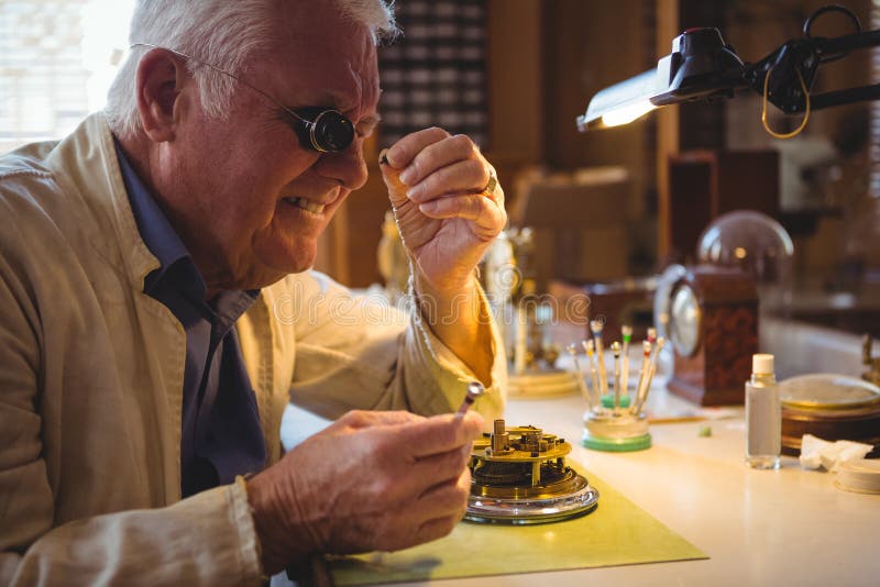 Horologist Repairing a Watch Stock Image - Image of clock, occupation ...