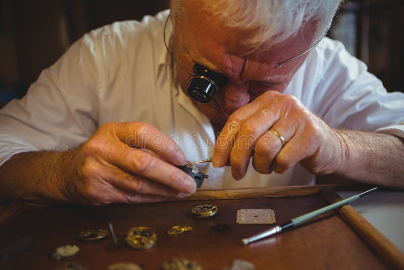 Horologist Repairing a Watch Stock Photo - Image of attentive ...