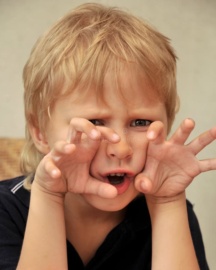 Grumpy Boy Face stock photo. Image of grouchy, grumpy - 16285184