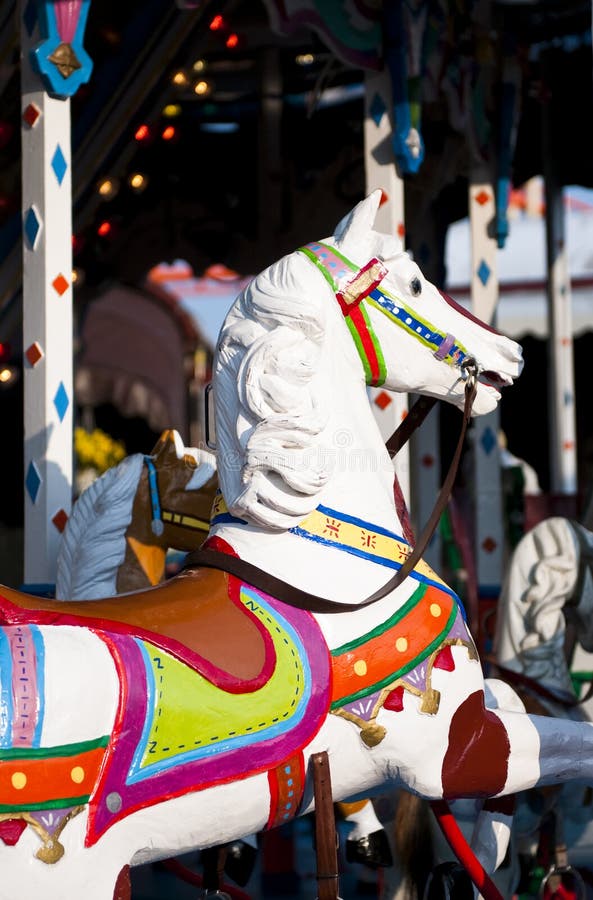 Horse carousel on fun fair stock photo. Image of entertainment - 13861536
