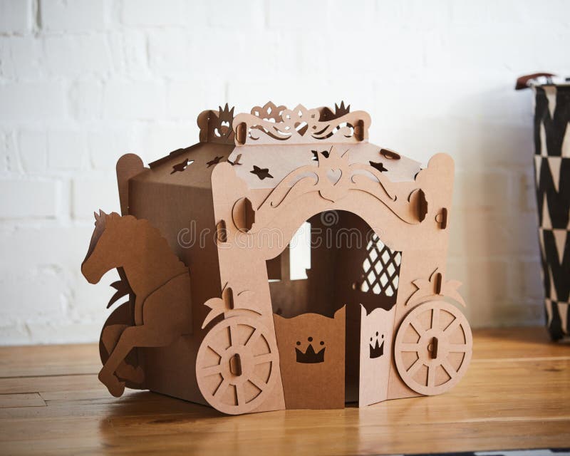A Horse And A Carriage Made Of Brown Cardboard,where The Horse Is ...