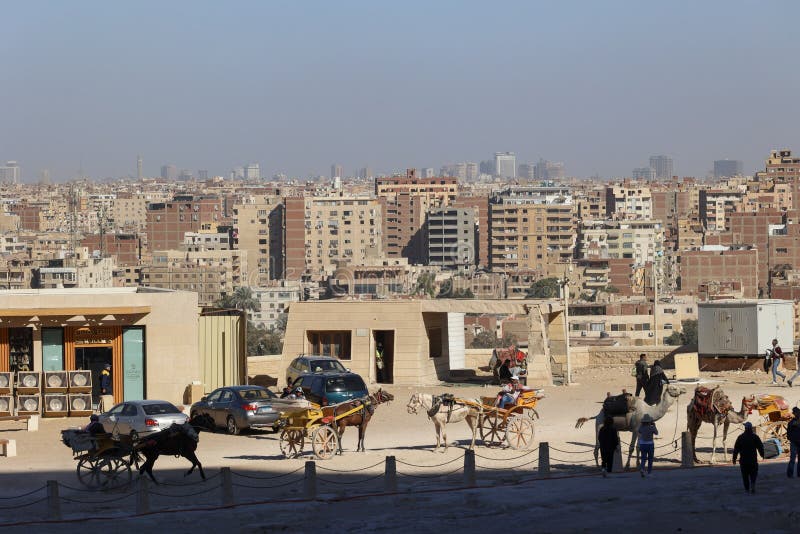 Horse-drawn Carriages and Wagons Parked in the Pyramid Complex ...