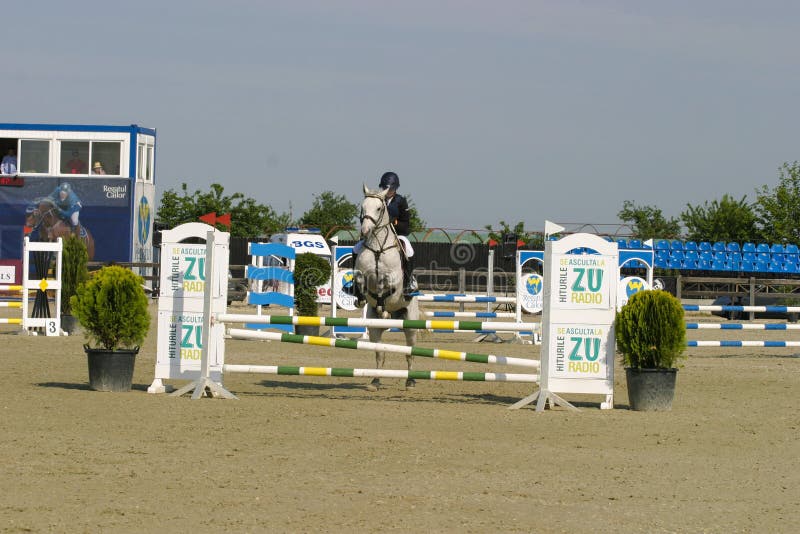 Equitation Contest, Horse Jumping Over Obstacle Editorial Photography ...