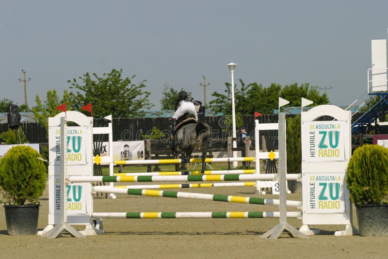 Equitation Contest, Horse Jumping Over Obstacle Editorial Stock Image ...