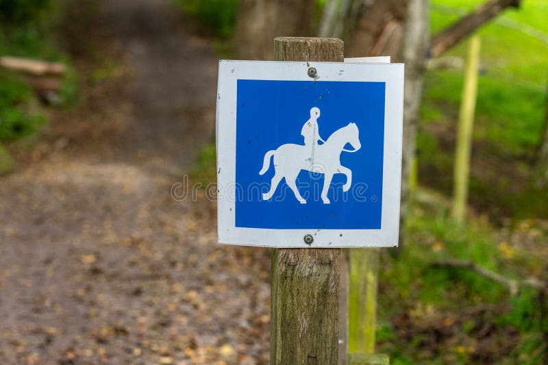 Horse Riding Path Sign by a Road.. Stock Image - Image of beetle ...